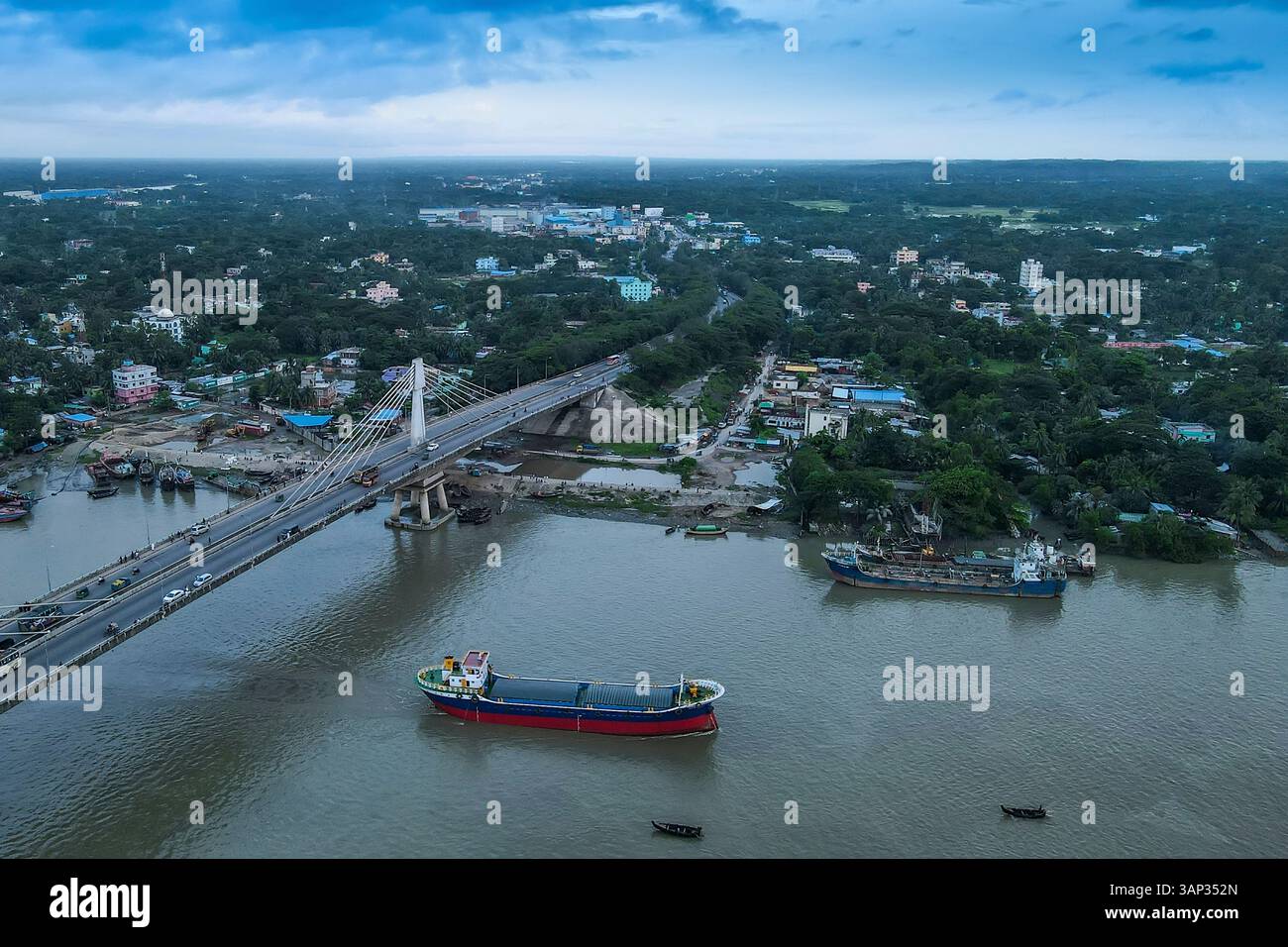 Aerial view of shah amanat bridge over karnafully river with ships in a ...