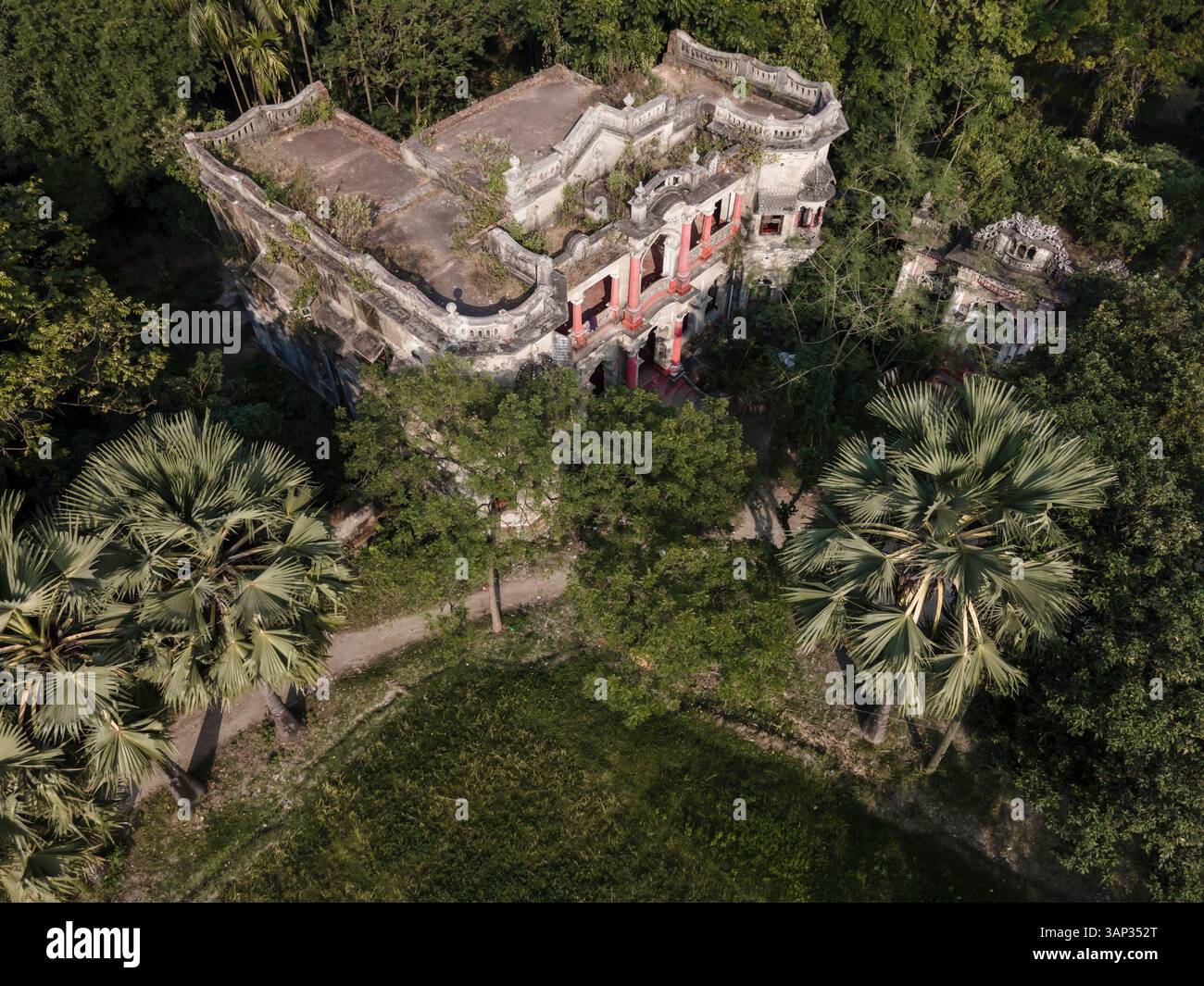 Aerial view of an elegant Mughal mansion surrounded by lush greenery ...