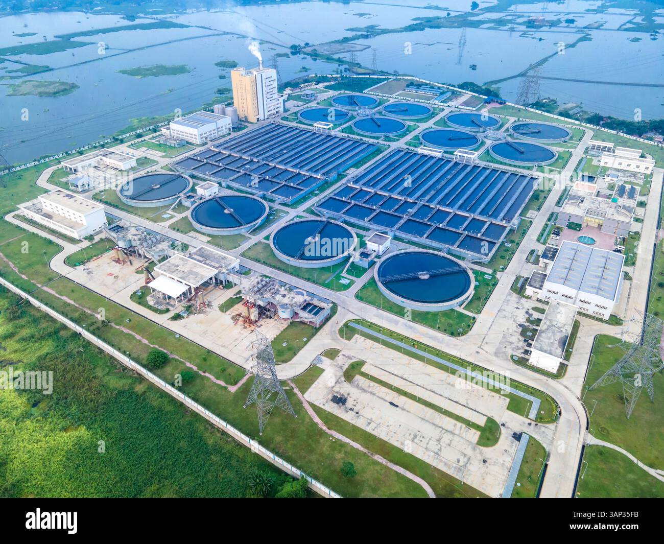 Aerial view of sewage treatment plant in urban area with modern ...