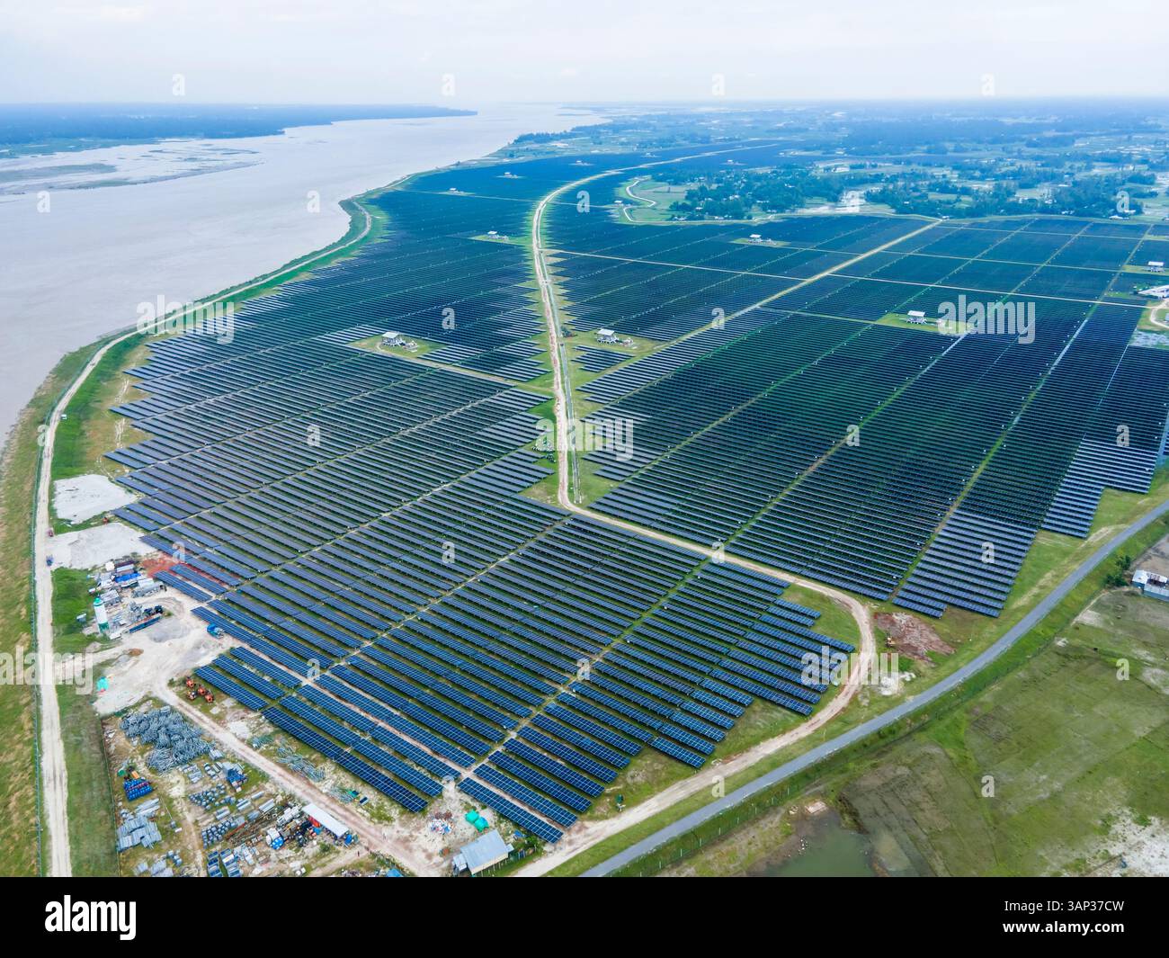 Aerial view of the largest solar plant with solar panels and the Teesta ...