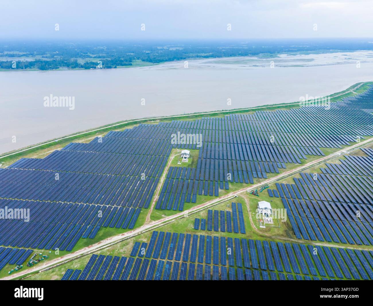 Aerial view of the largest solar plant with solar panels and the Teesta ...