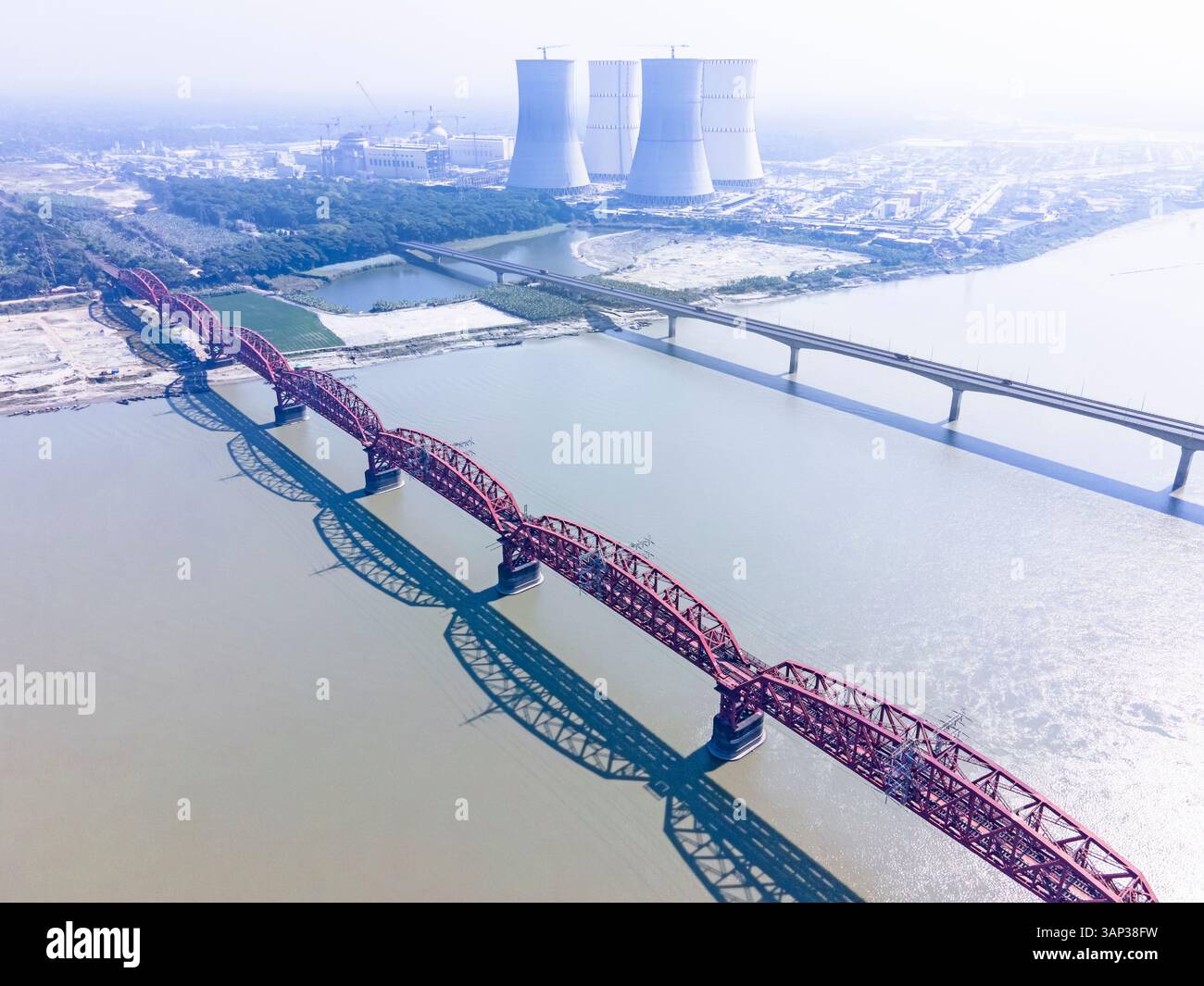 Aerial view of hardinge bridge over padma river with cooling towers in ...