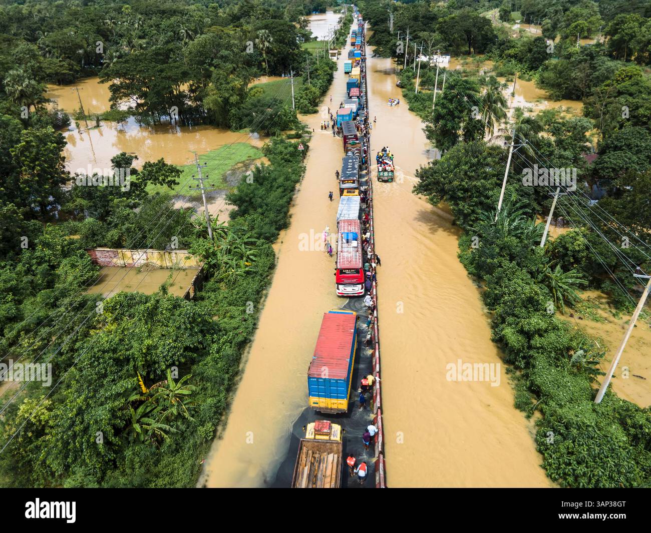 Chittagong, Bangladesh - 22 August 2024: Aerial view of flooded highway with stranded vehicles ...