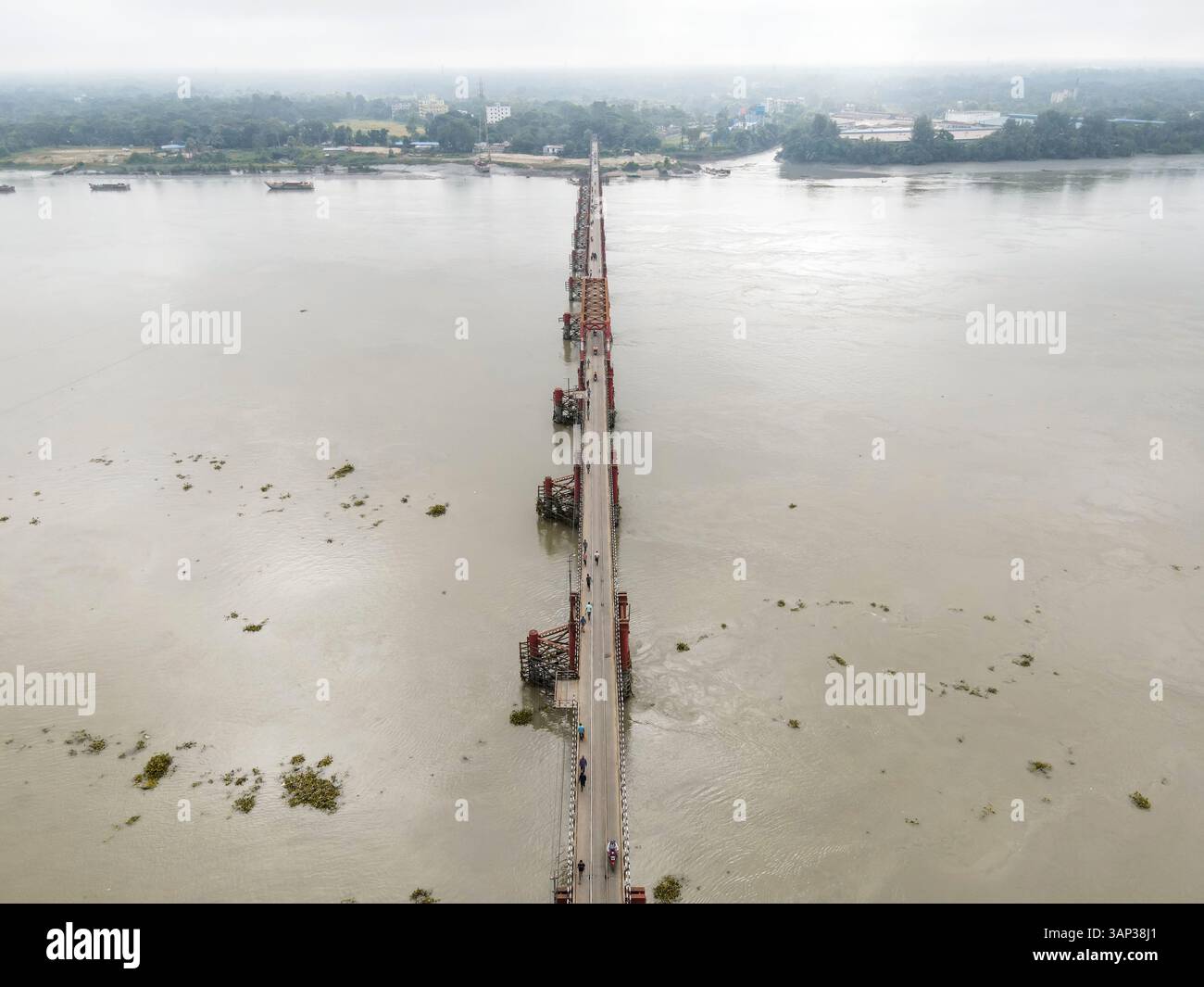 Aerial view of kalurghat bridge spanning the karnaphuli river, a ...