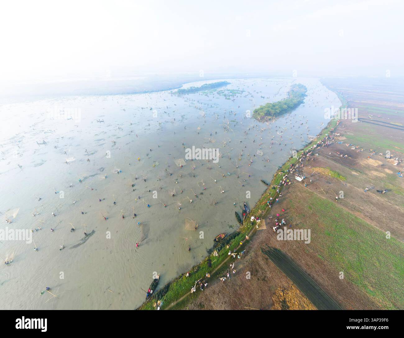 Aerial view of traditional fishing festival with local fishermen using ...