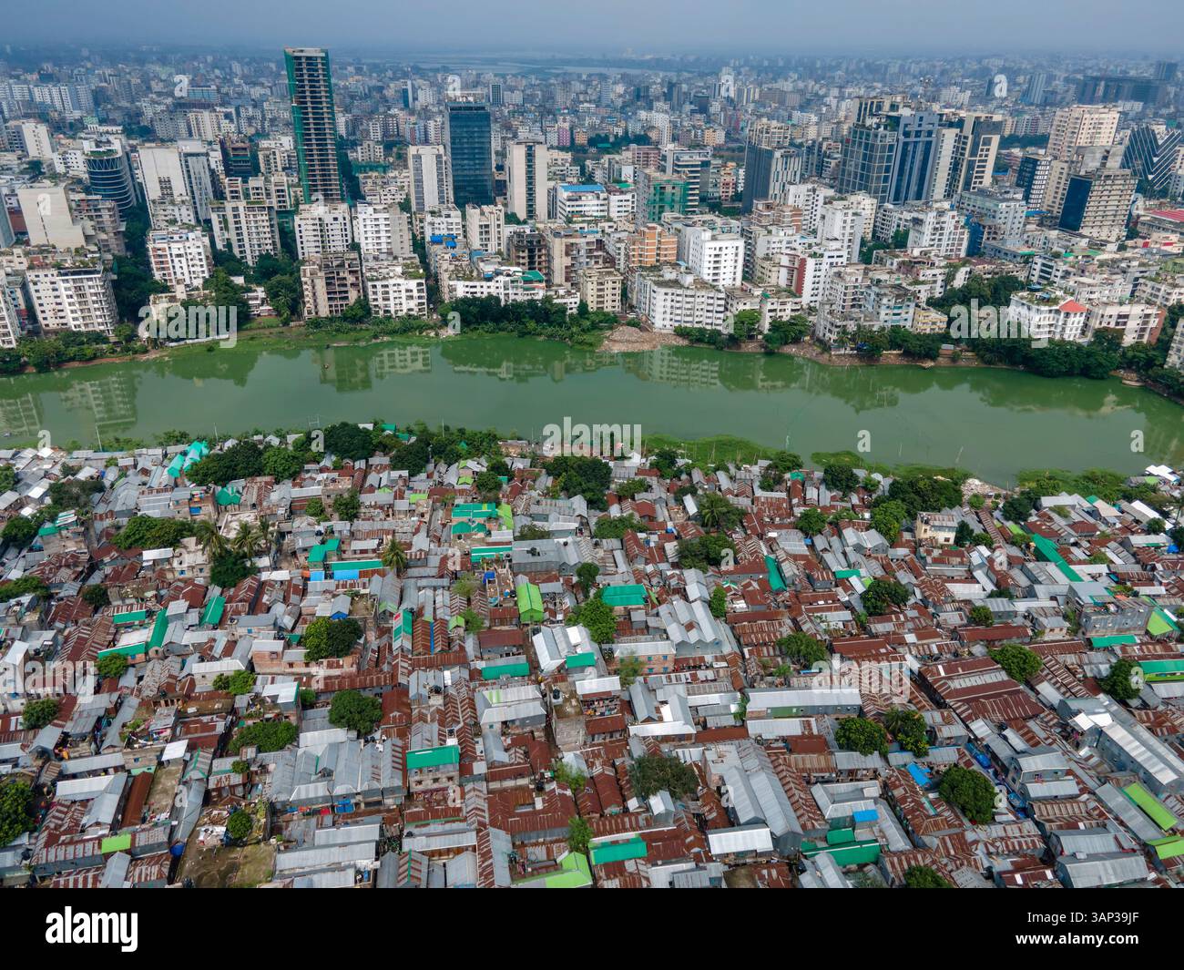 Aerial view of Banani Lake surrounded by Korail Slums and high-rise ...