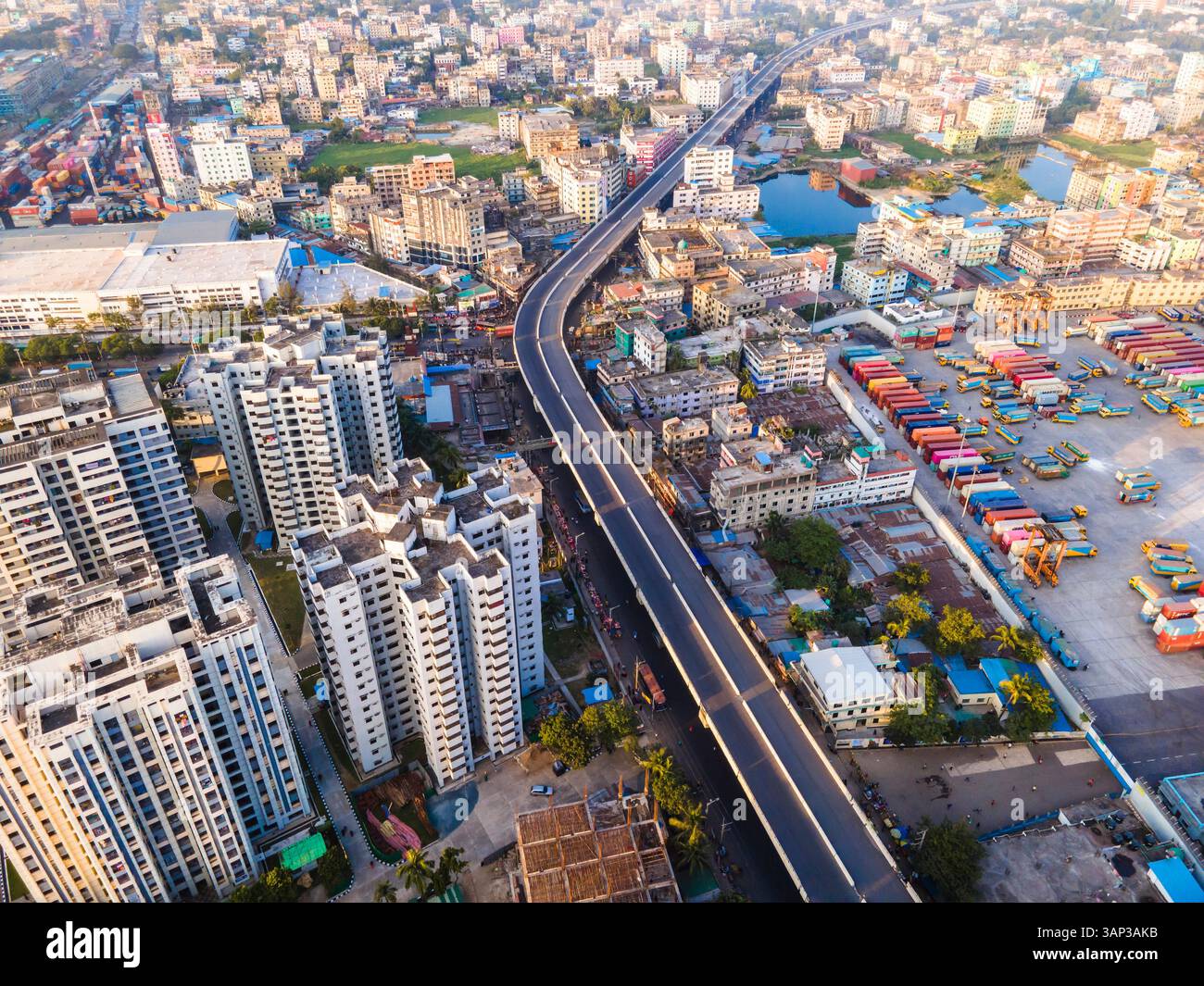 Aerial view of chattogram port with bustling traffic and modern high rise buildings, chittagong ...