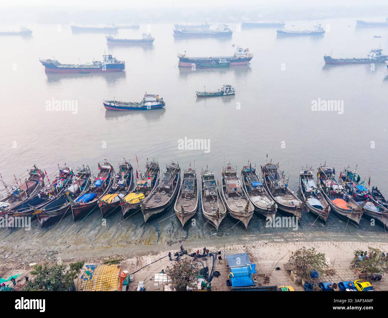 Aerial view of fishing boats at fishery ghat on the Karnaphuli river, Chittagong, Bangladesh ...