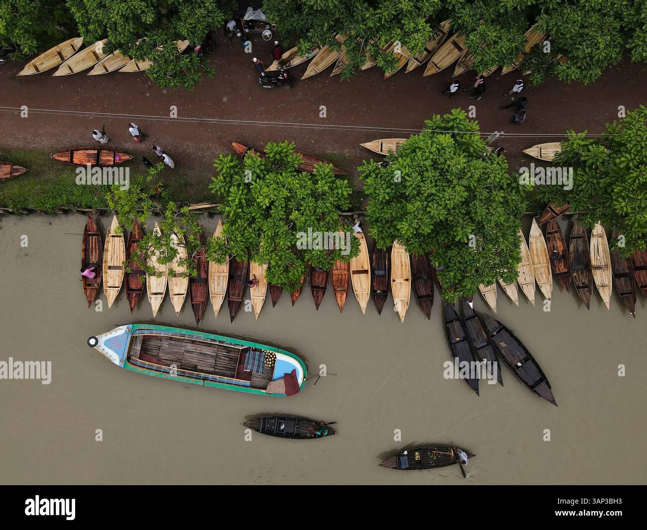 Aerial view of vibrant boat market during monsoon season with various ...