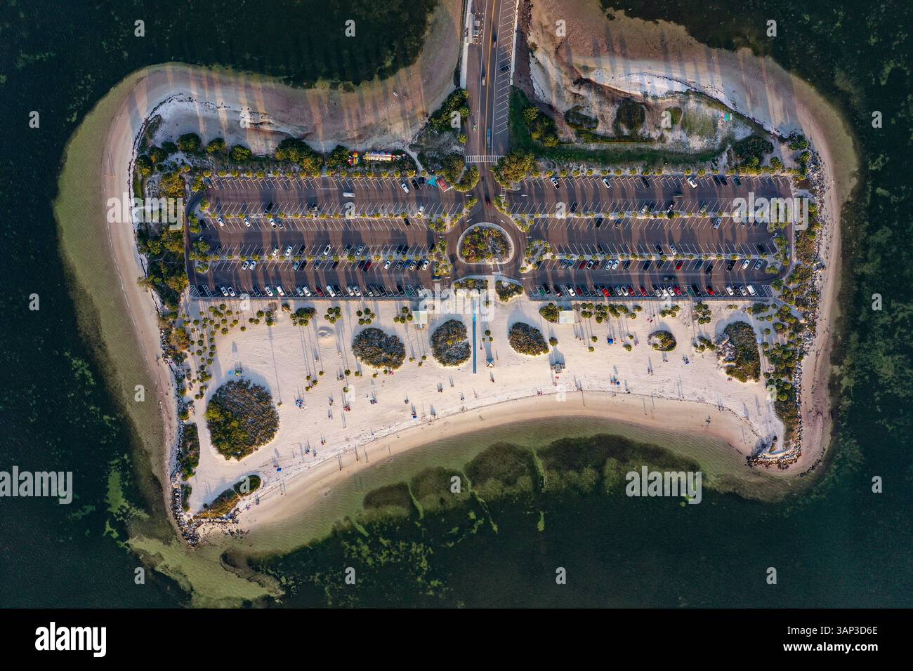 Aerial view of an island connected by a road with white sand and ...
