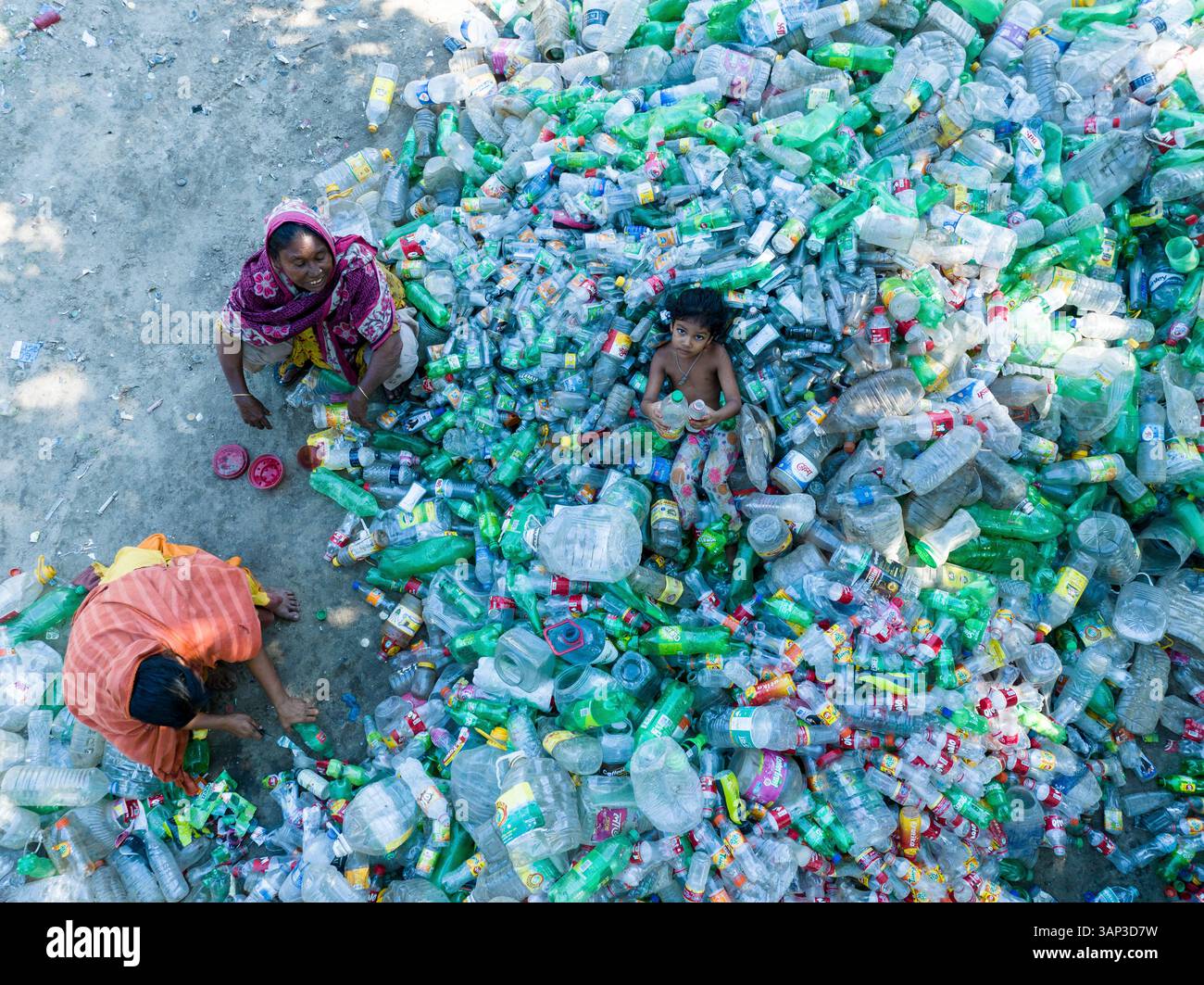 Araihazar, Bangladesh - 09 November 2024: Aerial view of people working ...