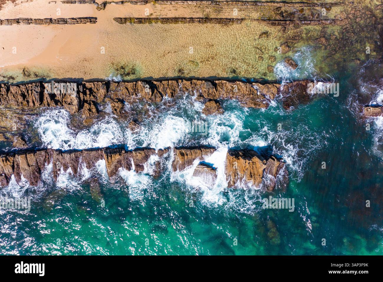Aerial view of natural swimming areas formed by rocks in a nature ...