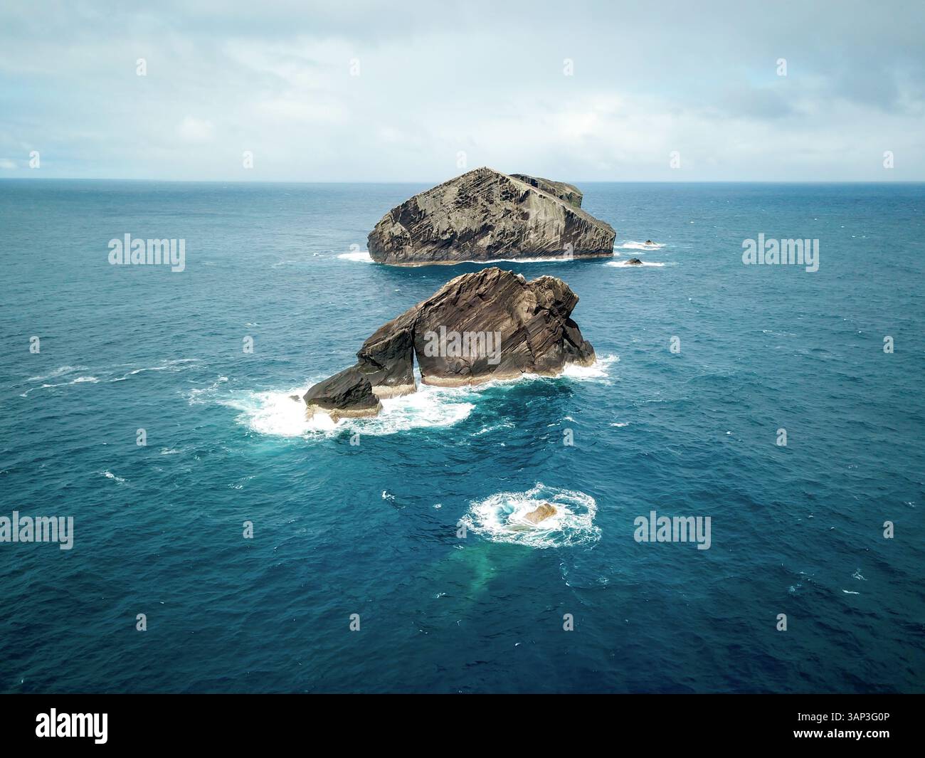 Aerial view of Ilhéus dos Mosteiros, small rocky islands which are the ...