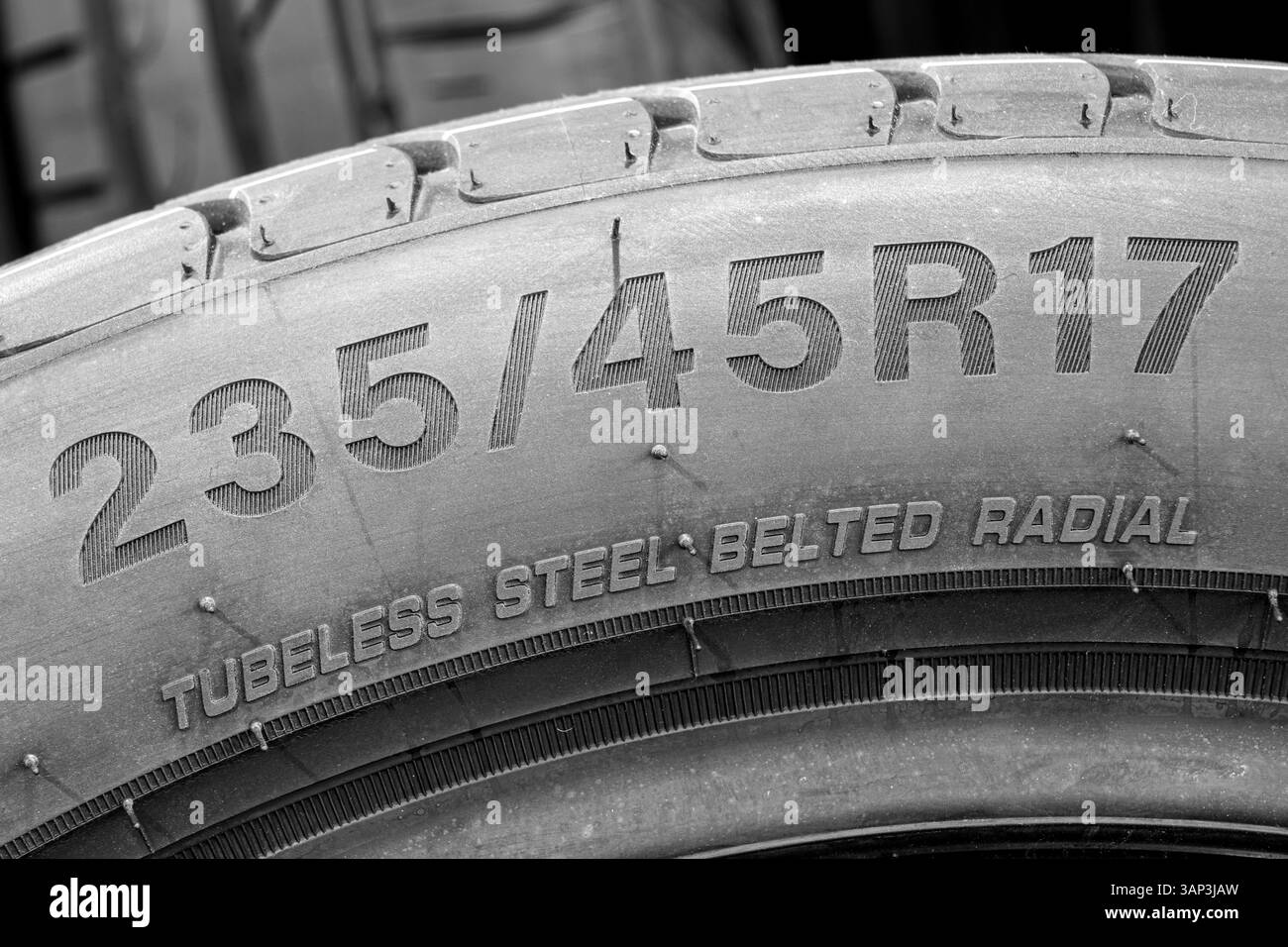 Side view of a large size high performance tire with an indication of ...