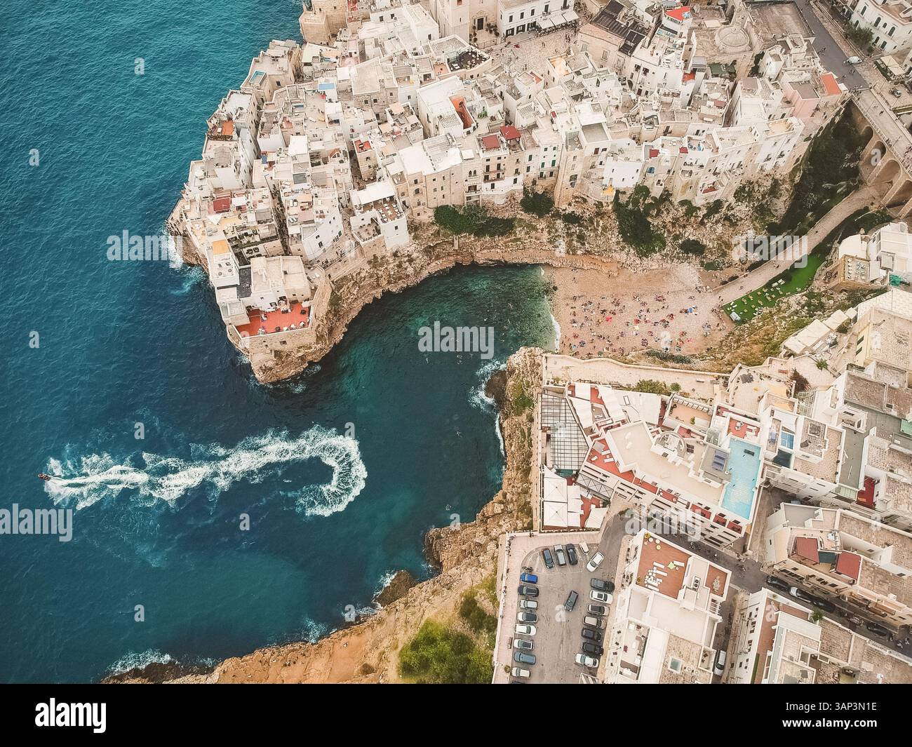 Aerial view of a city on the shore of the coast, Polignano a Mare ...