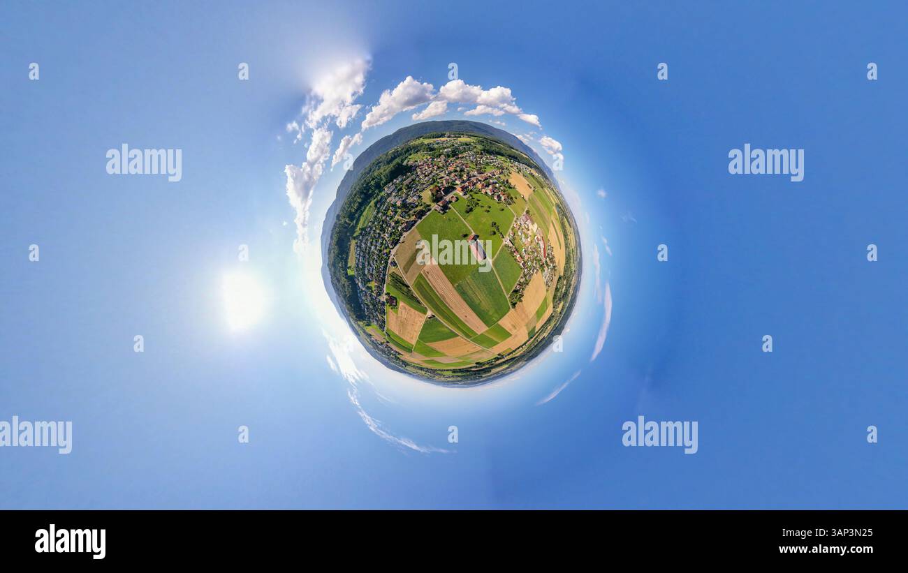 Aerial view of a tiny planet perspective of a serene village surrounded ...