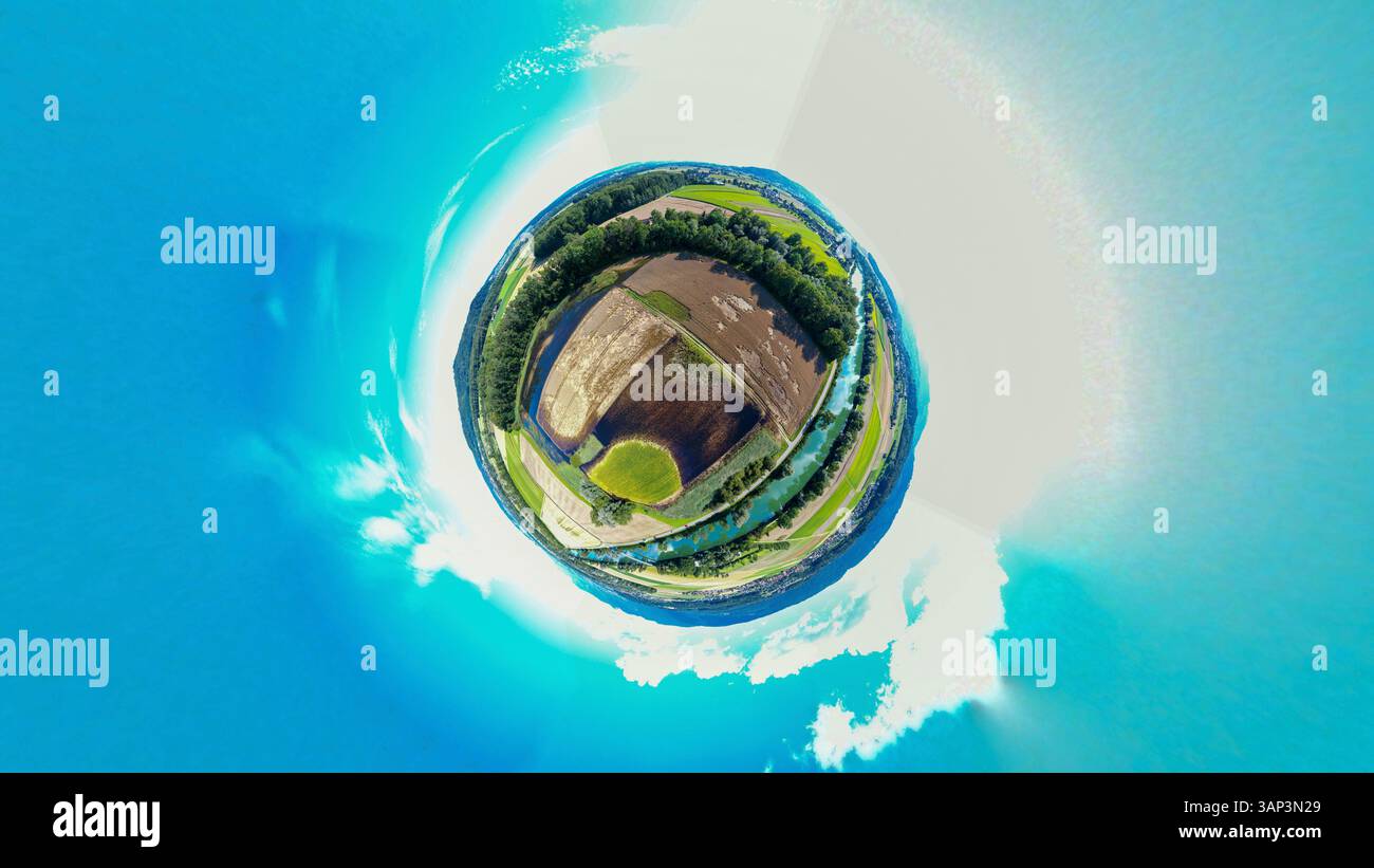 Aerial view of a tiny planet landscape featuring serene water, lush ...