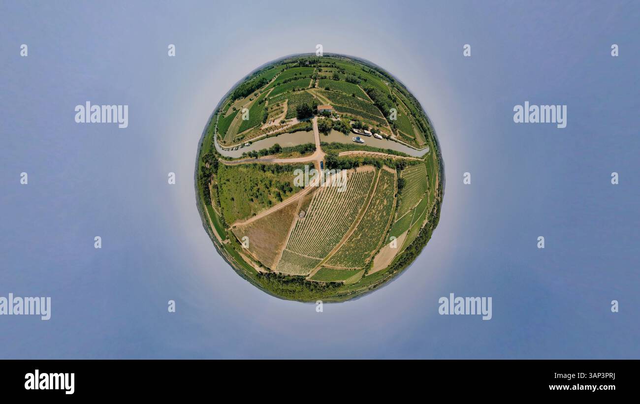 Aerial view of a tiny planet landscape featuring vineyards and fields ...
