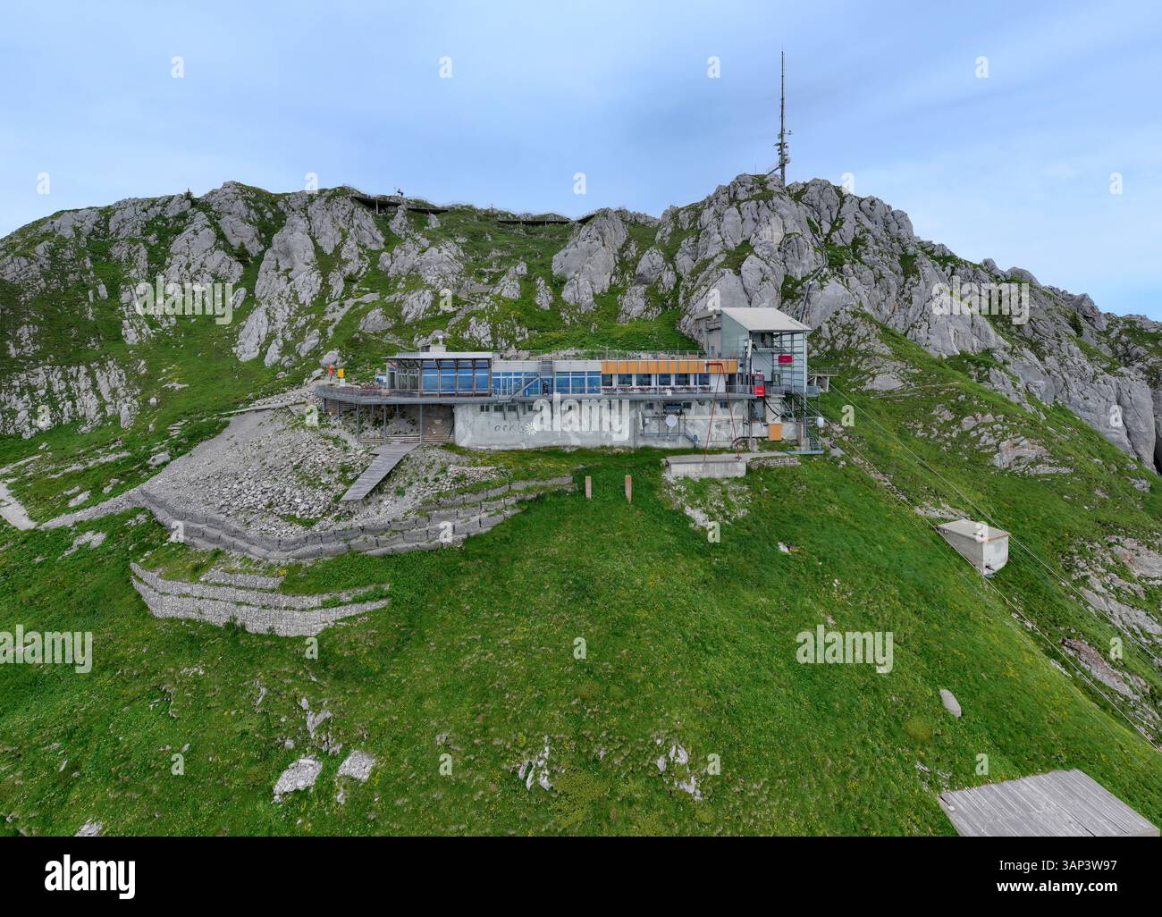 Aerial view of Stockhorn peak with rugged terrain and a cable car ...