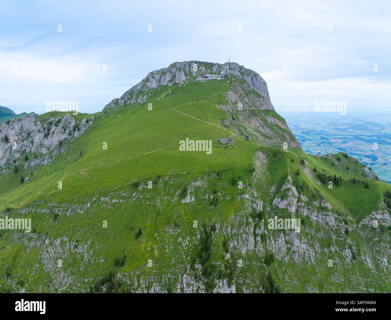 Aerial view of Stockhorn Mountain with scenic green hills and rocky ...