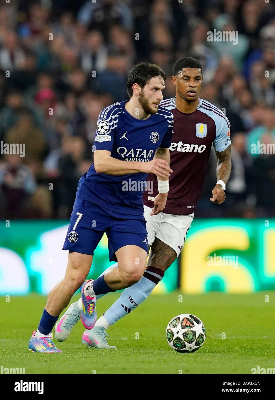 Birmingham, UK. 15th Apr, 2025. Khvicha Kvaratskhelia of Paris St Germain dispossess Aston Villa ...
