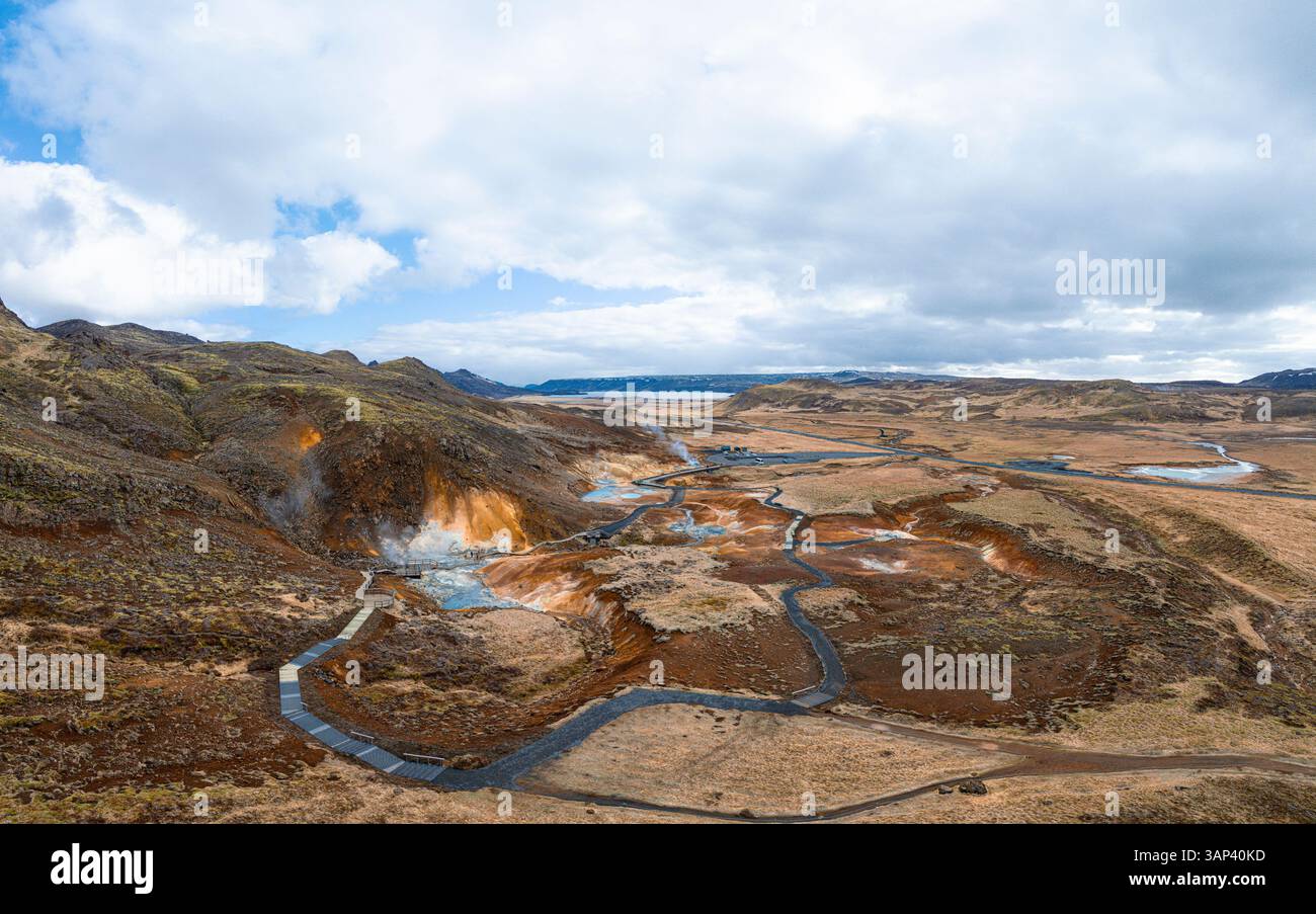 Aerial view of geothermal area with volcanic landscape and river ...