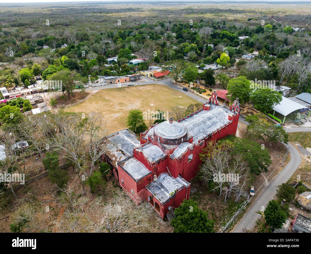 Aerial view of high green forest landscape with Mayan church, Sotuta ...