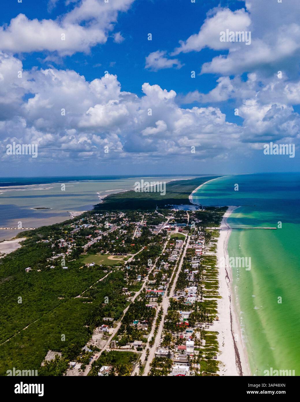 Aerial view of El Cuyo with Playa El Cuyo, a long coastline peninsula with beaches in Tizimín ...