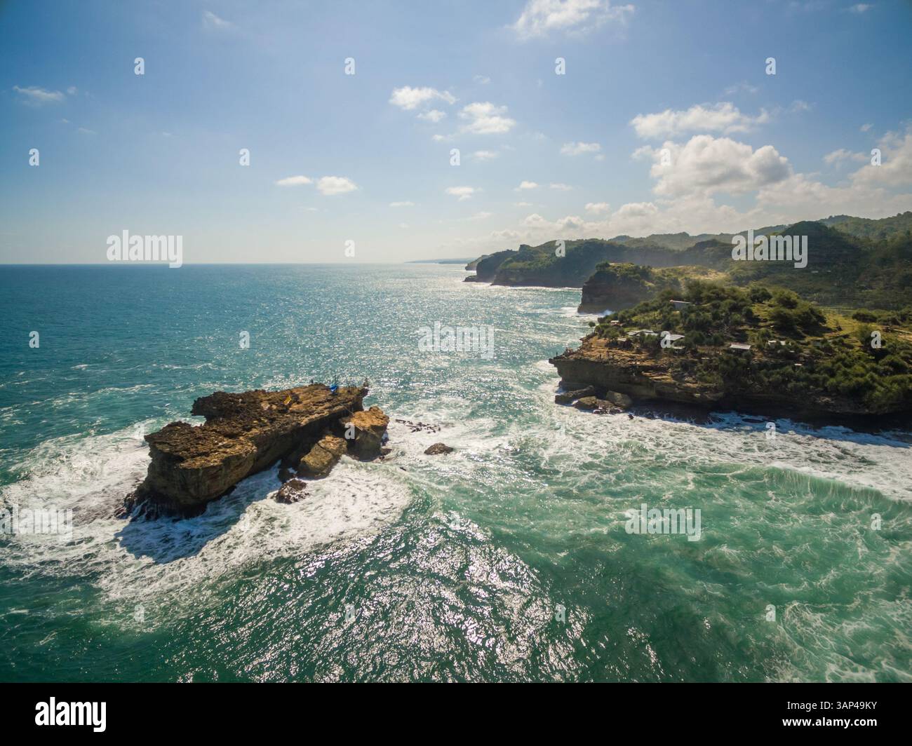 Aerial view of isolated rock formation on Java sea, Indonesia Stock ...