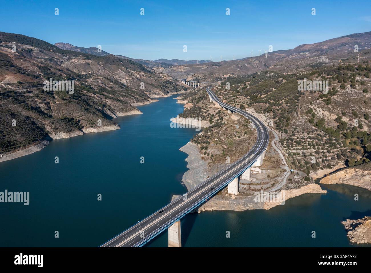 Aerial view of a suspended bridge crossing Guadalfeo river near Granada ...