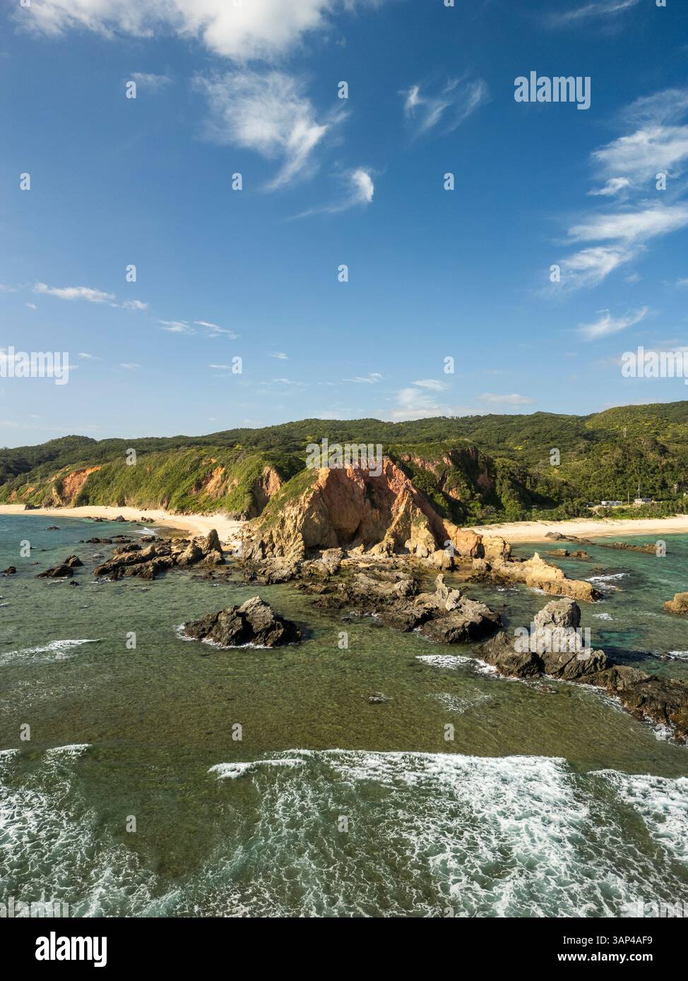 Aerial view of beautiful Adan Beach with rocky shore and cliffs under a ...