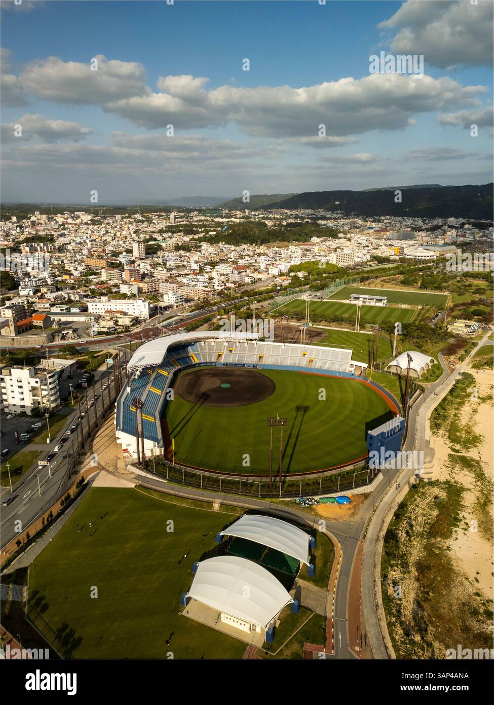 Aerial view of Seikinomori Beach with a beautiful cityscape featuring a ...
