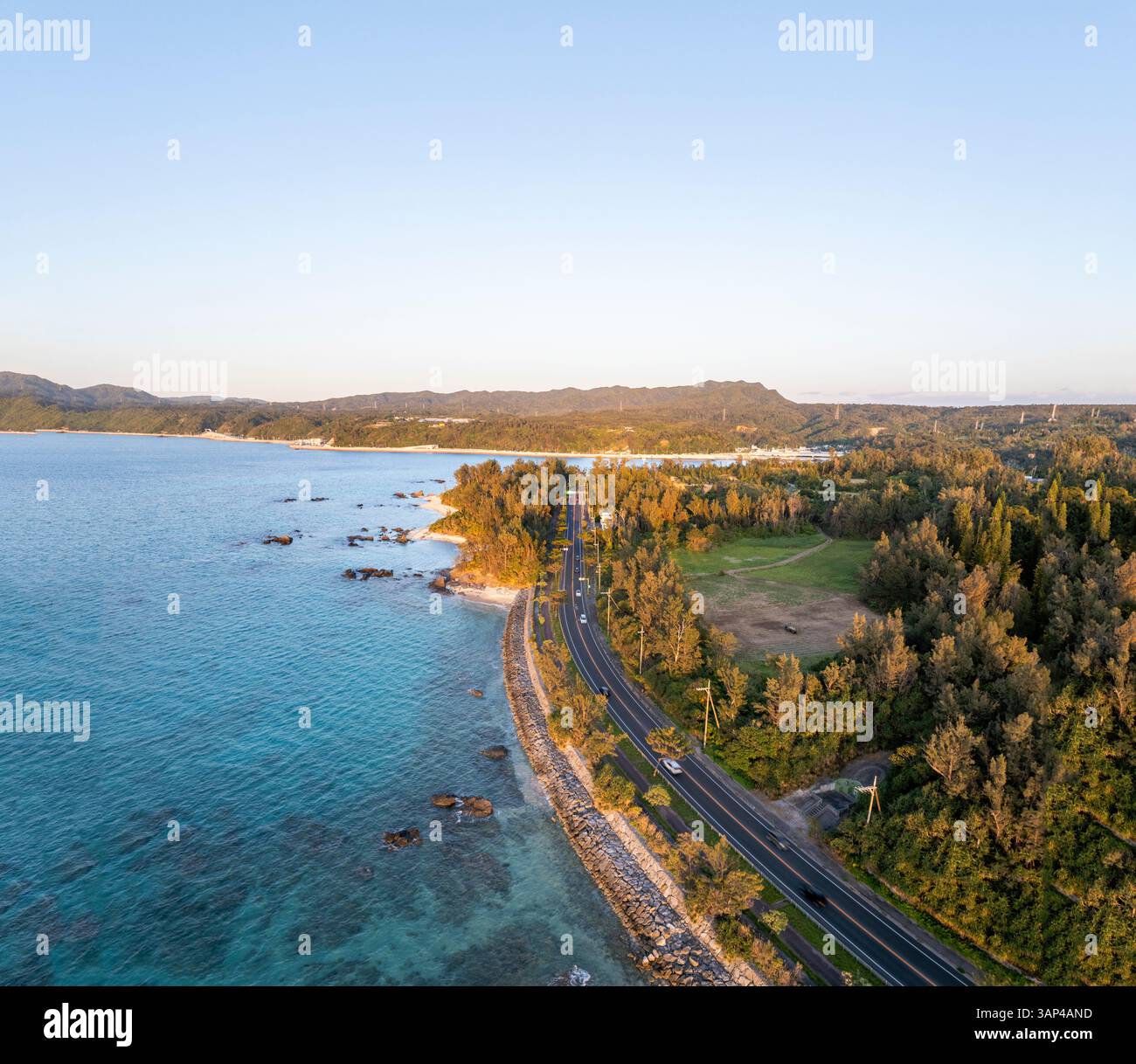 Aerial view of emerald beach with tranquil waves and sandy shore, Nago ...