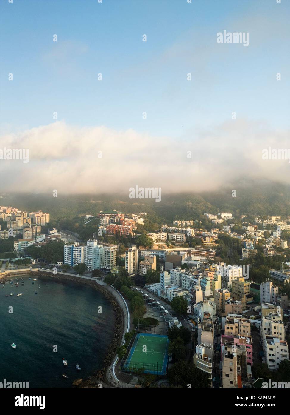 Aerial view of beautiful coastal cityscape with residential buildings ...