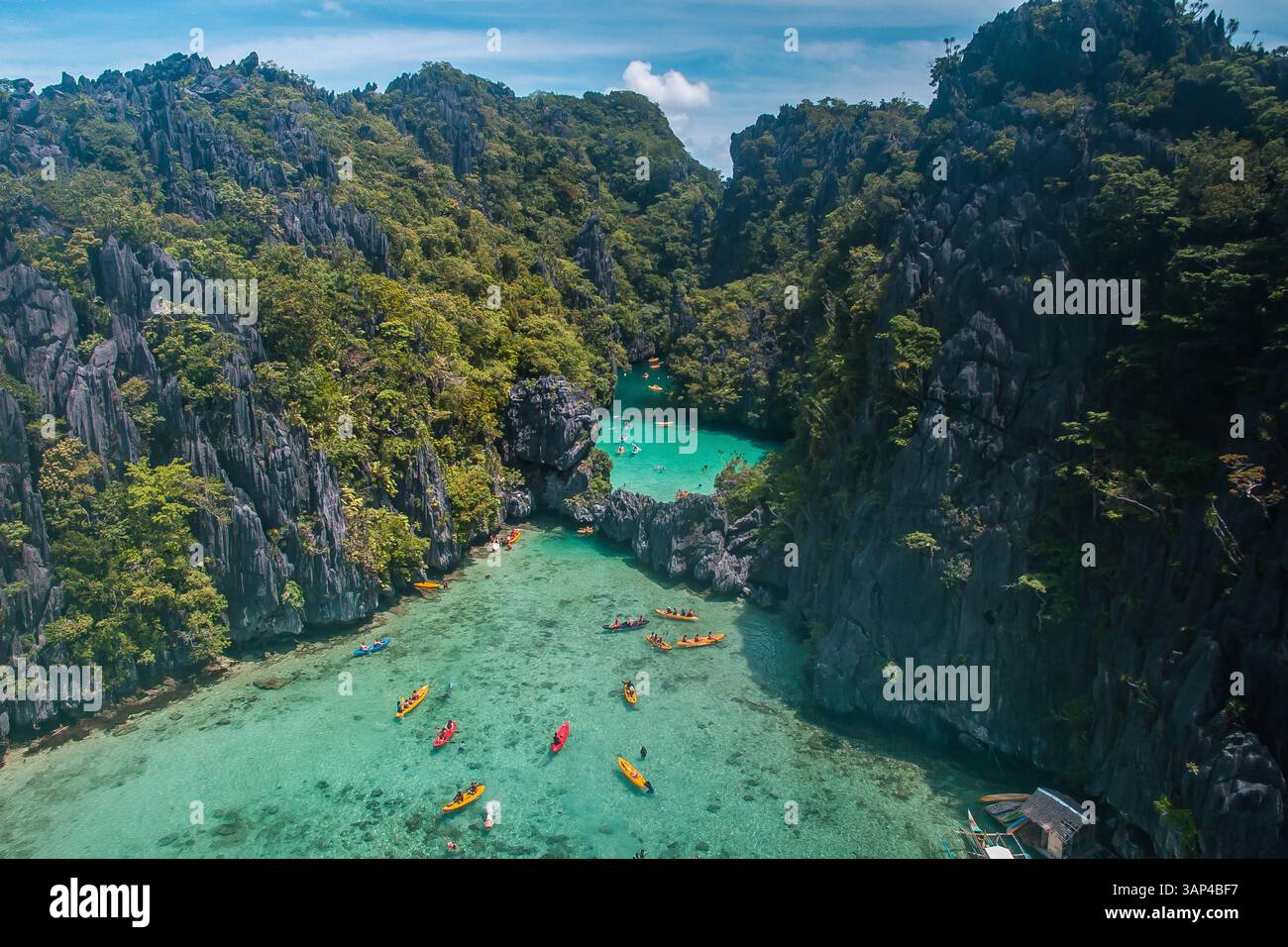 An aerial view of tourists kayaking going in and out in the Small ...