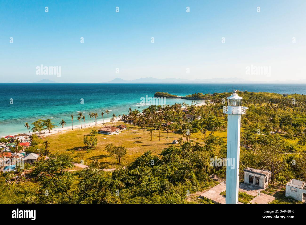 Aerial view of lighthouse on white sand Langob Beach in Malapascua ...
