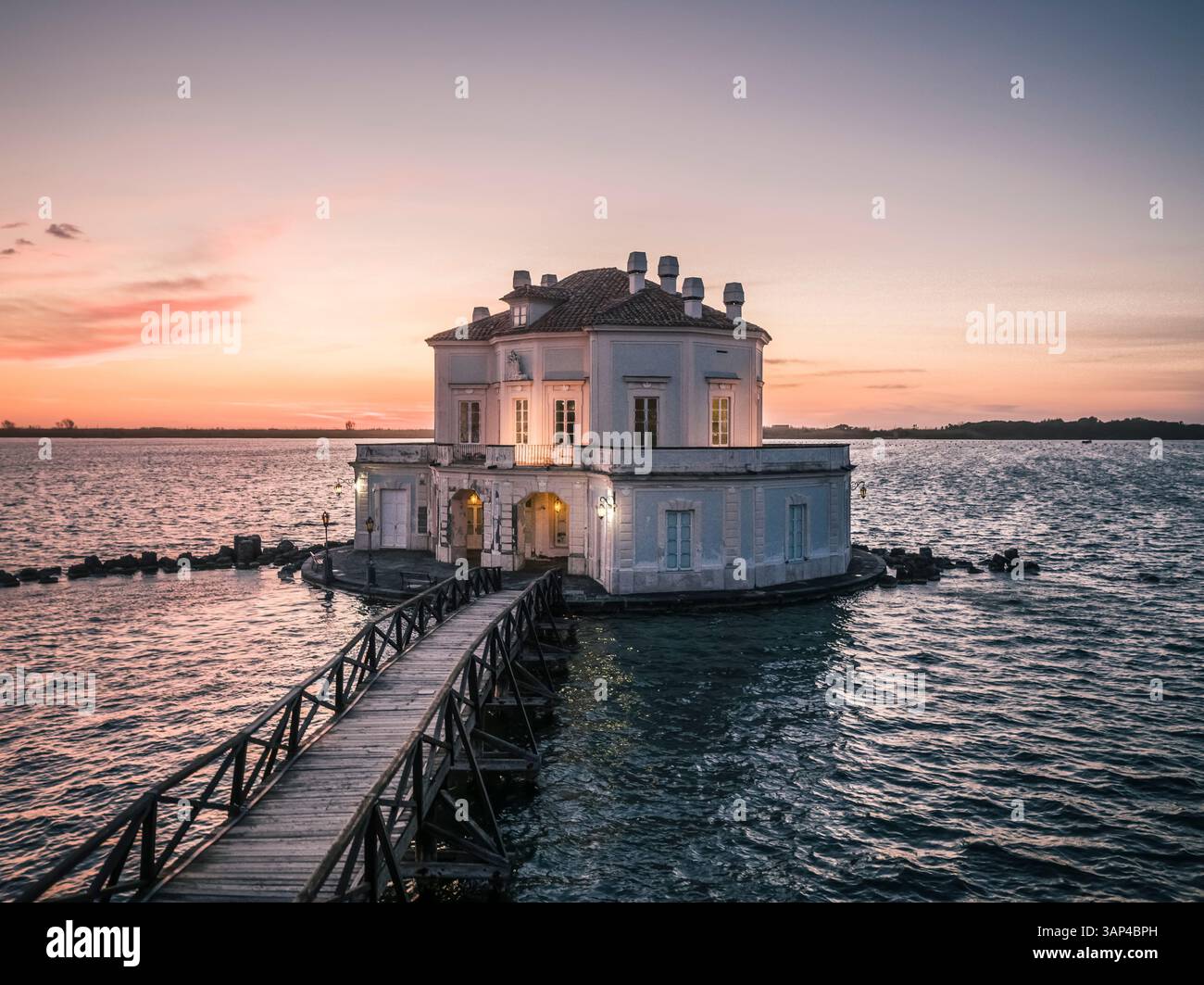 Aerial view of fusaro lake with the elegant casina vanvitelliana at ...