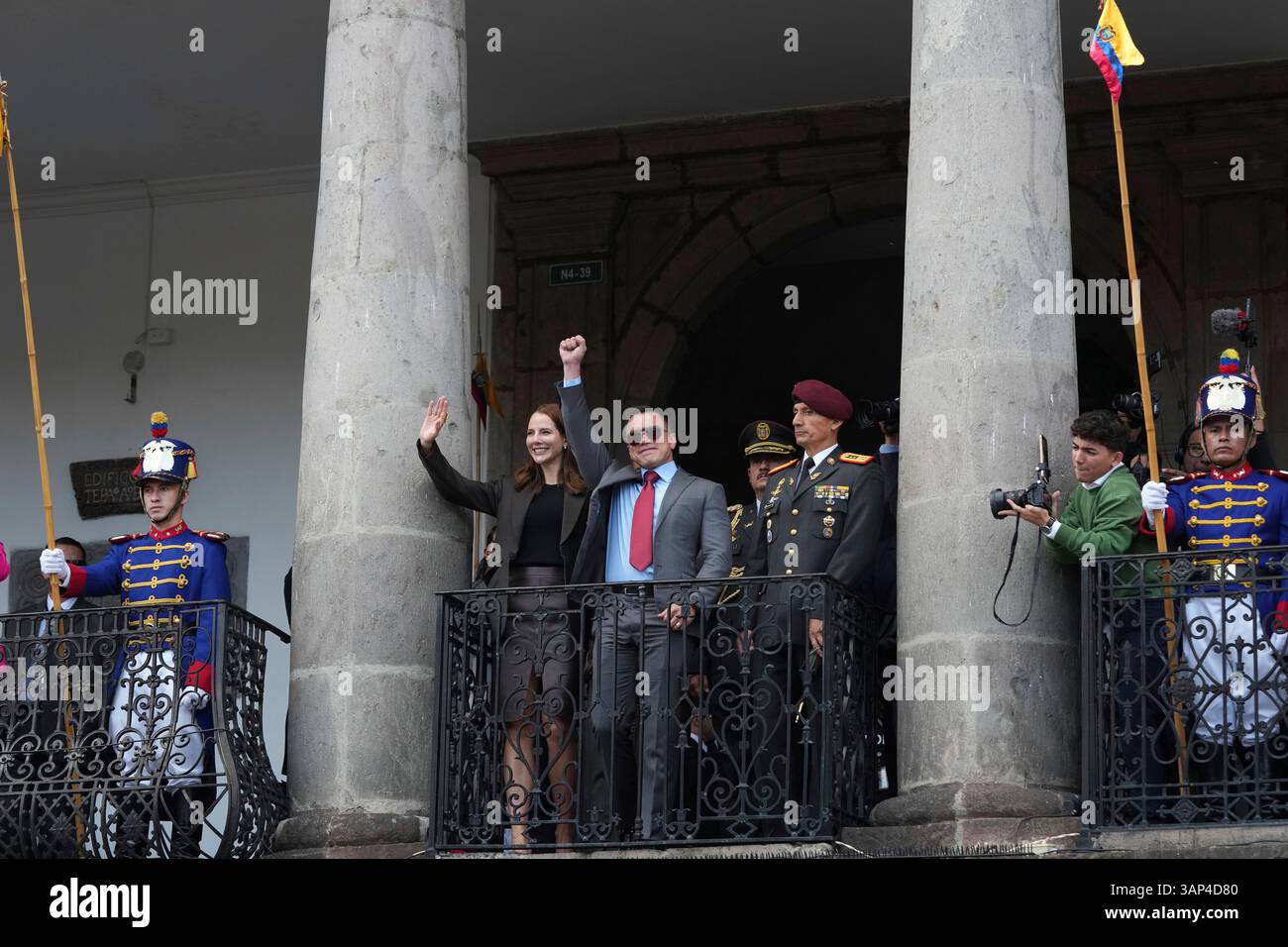 Ecuador's President Daniel Noboa and his wife Lavinia Valbonesi gesture from Carondelet Palace ...
