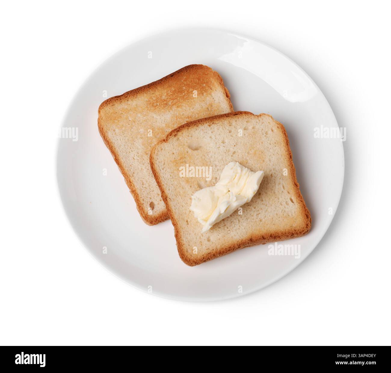 Tasty toast bread with butter isolated on white, top view Stock Photo ...