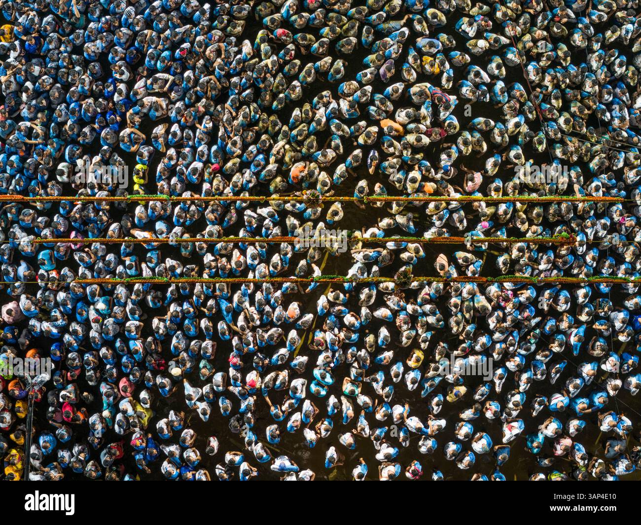 Aerial view of vibrant Dahi Handi festival with a bustling crowd ...