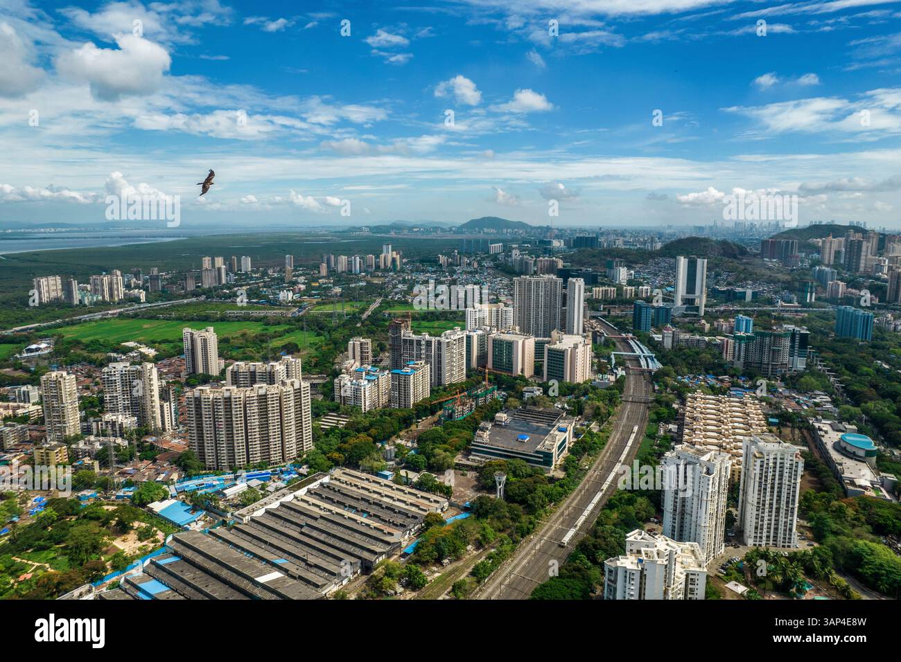 Aerial view of modern city skyline at sunset, Bhandup West, Mumbai ...