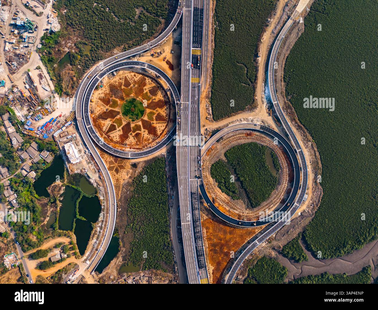 Aerial view of roundabout patterns on Trans Harbour Link Road, Sewri ...