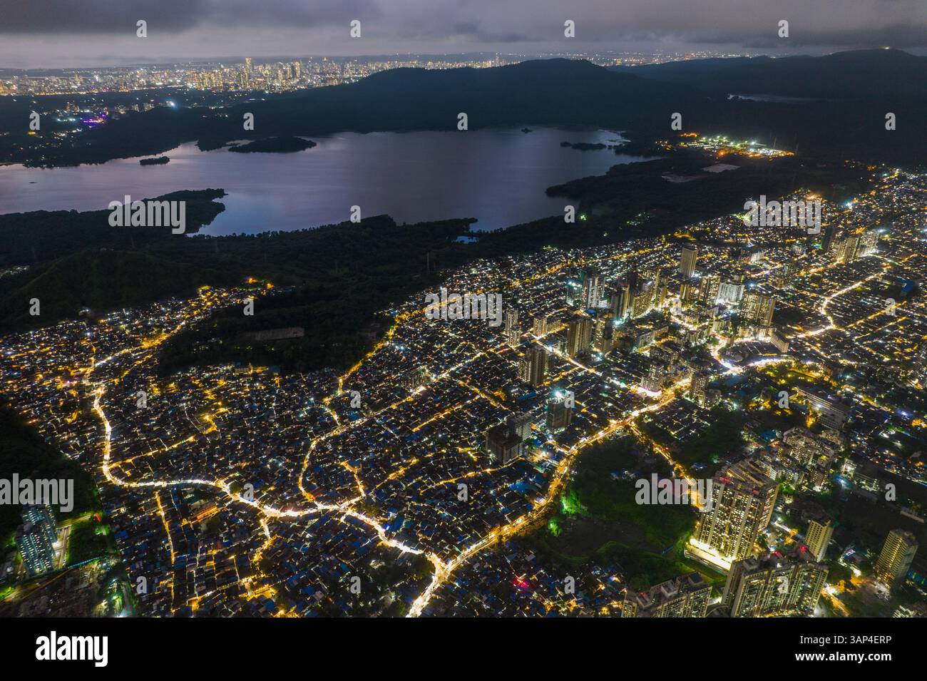 Aerial view of residential district and skyscrapers by Vihar Lake ...
