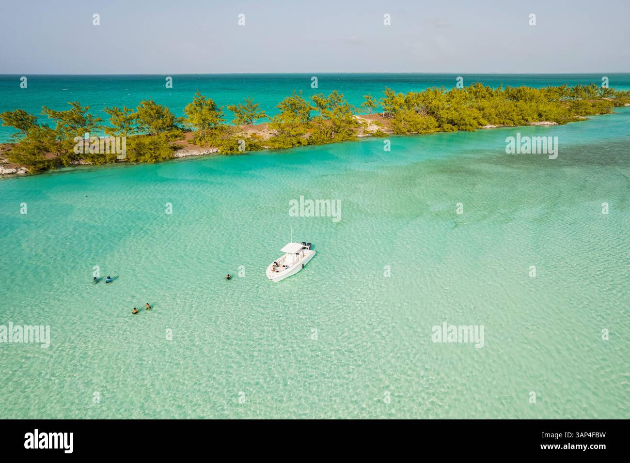 Aerial View of boaters enjoying a swim in shallow water protected by a ...