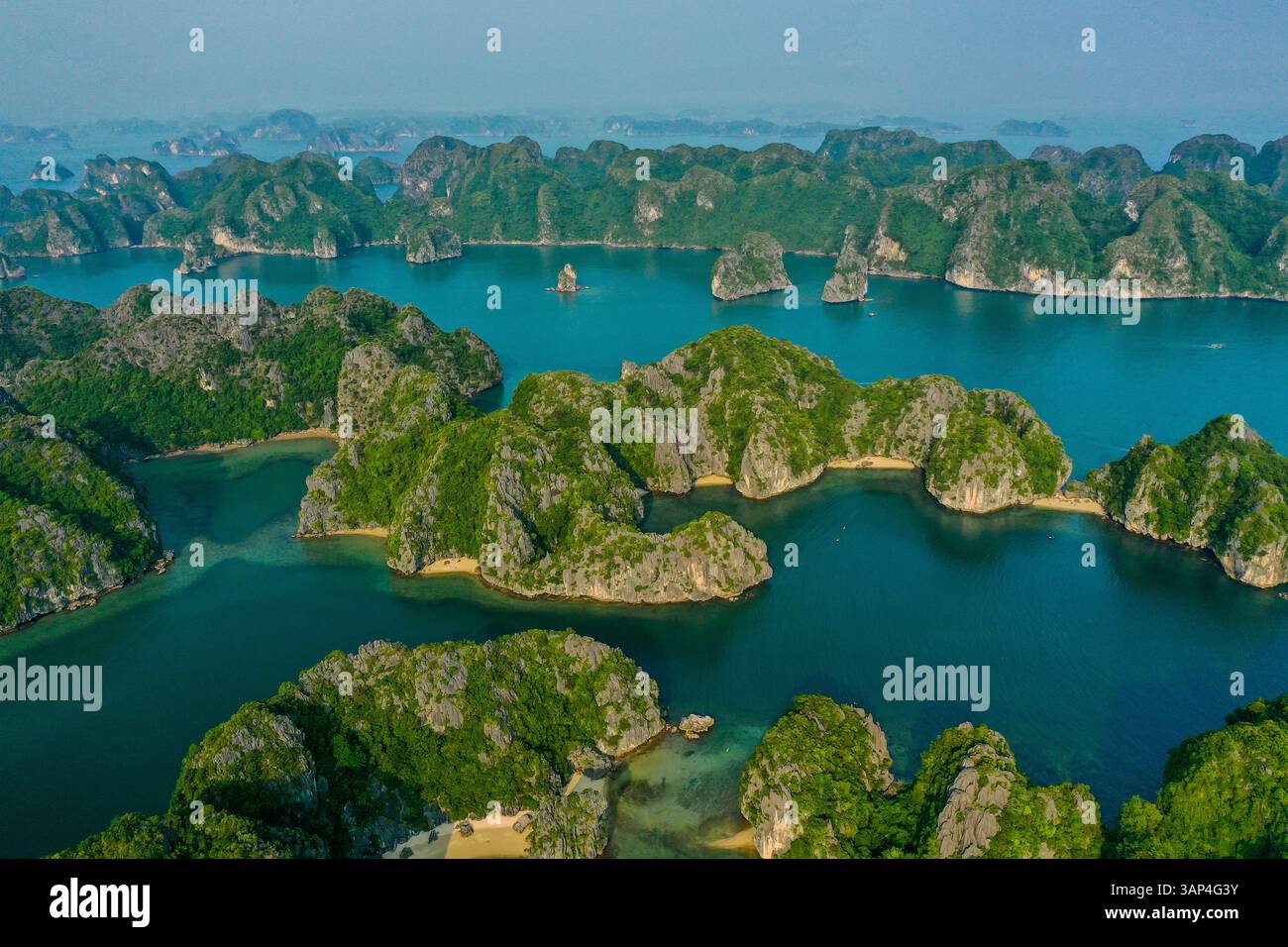 Aerial view of scattered islands with inlets and coves at Ba Trai Dao ...