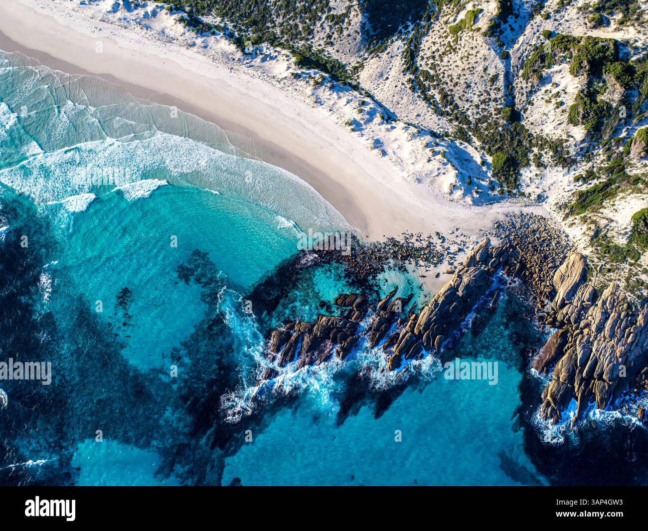 Aerial view of pristine white sand beaches and turquoise waters of ...