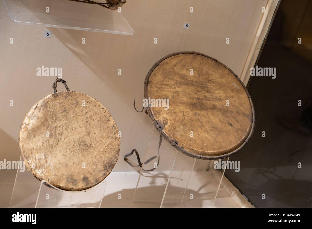 Left to right: A Tasa / Dakari (uni-facial drum) from Balangir and Puri ...