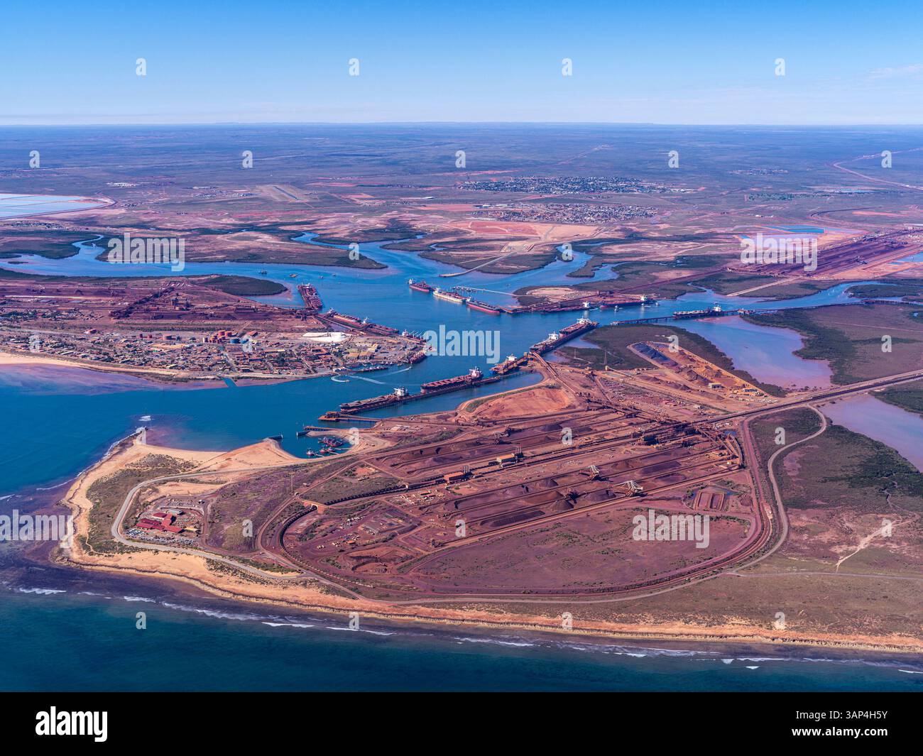 Aerial view of ships loading iron ore for export in Port Hedland ...