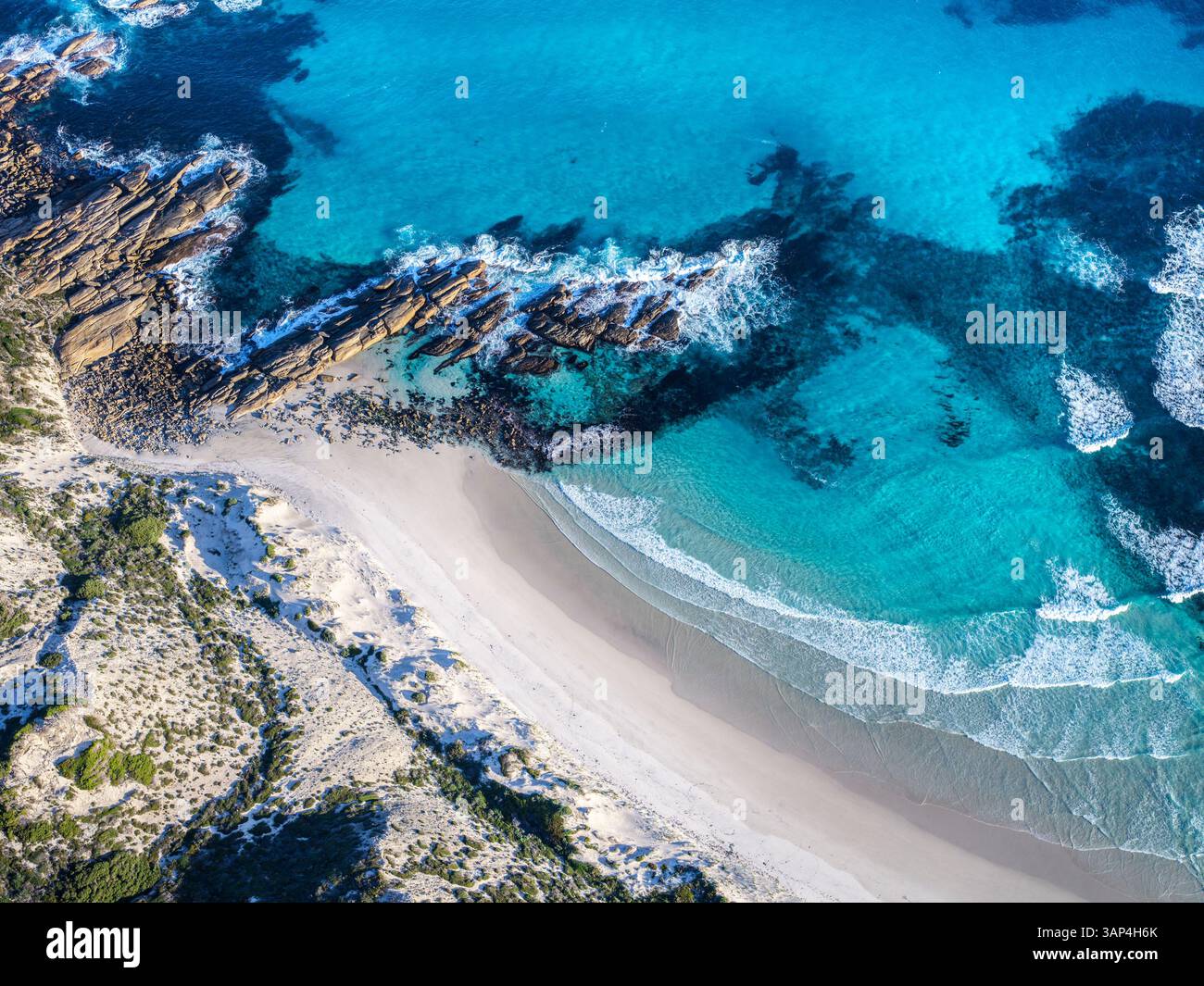 Aerial view of pristine white sand beaches and turquoise waters in ...