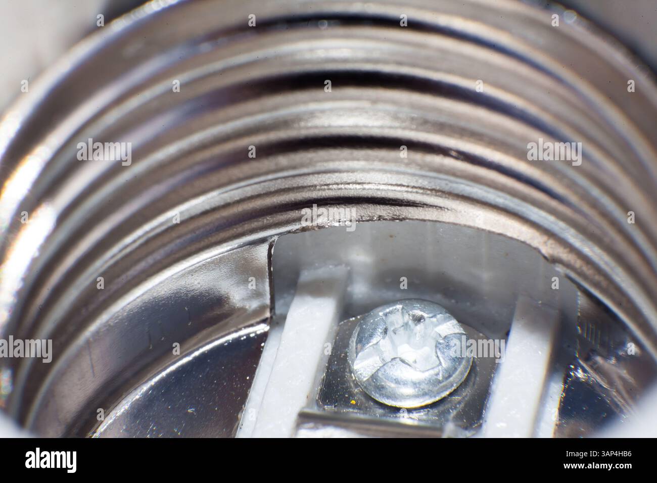 Light bulb base close up. Close-up of the inside of the lamp base Stock ...